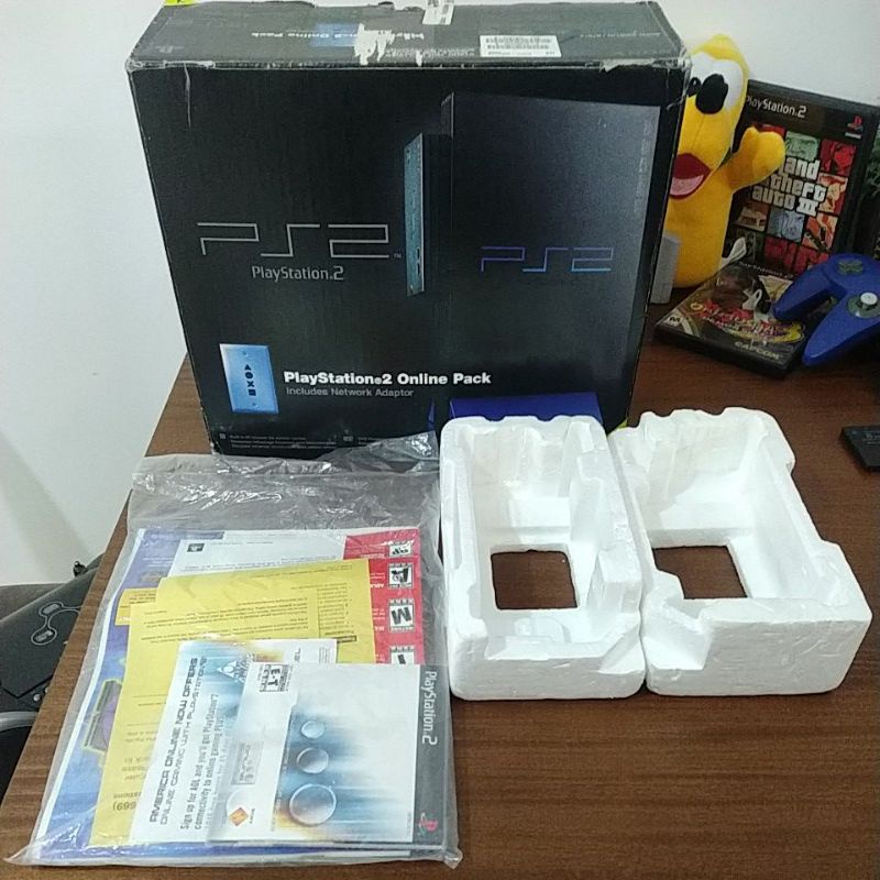 Caixa original ps2 Fat com manuais lacrados e isopor em ótimo estado ...
