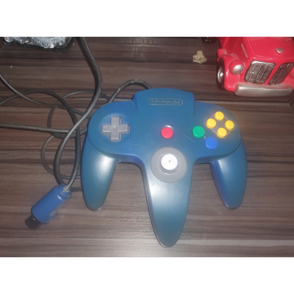 Controle Nintendo 64 azul - Analogico ruim | Shopee Brasil