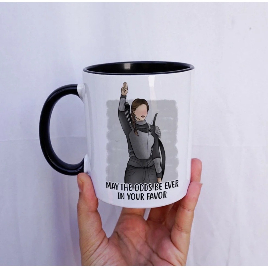 Caneca Jogos Vorazes (Katniss e Peeta) Exclusividade Art Gaby🐲 Conheça ... Caneca Jogos Vorazes (Katniss e Peeta) Exclusividade Art Gaby🐲 Conheça ...