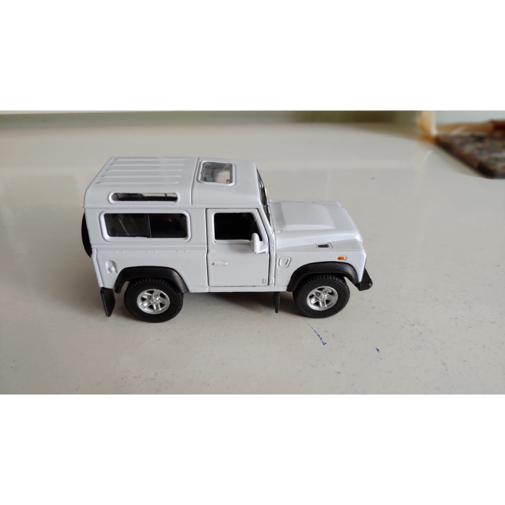 Miniatura em Metal - Land Rover Defender 90 - Branco | Shopee Brasil