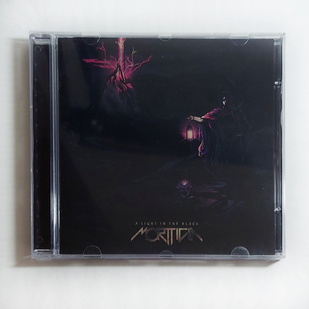 Mortticia - A Light In The Black - CD (Importado) | Shopee Brasil
