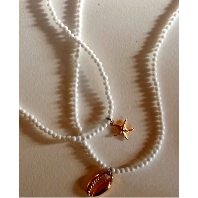 colares praianos estrela e buzios | Shopee Brasil