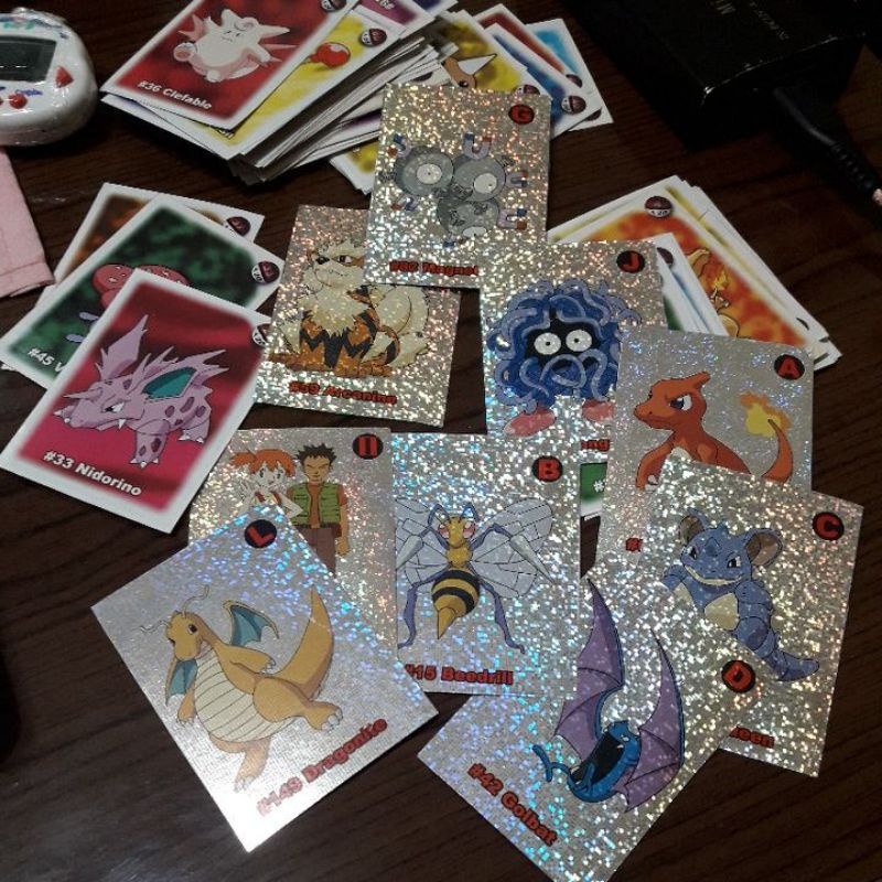 Lote figurinhas album Pokemon 1999 temos que pegar, panini | Shopee Brasil