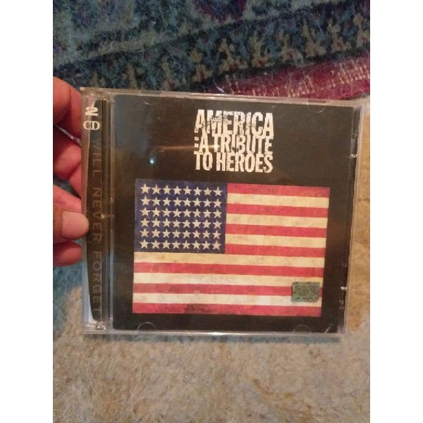 CD duplo America: A Tribute To Heroes | Shopee Brasil
