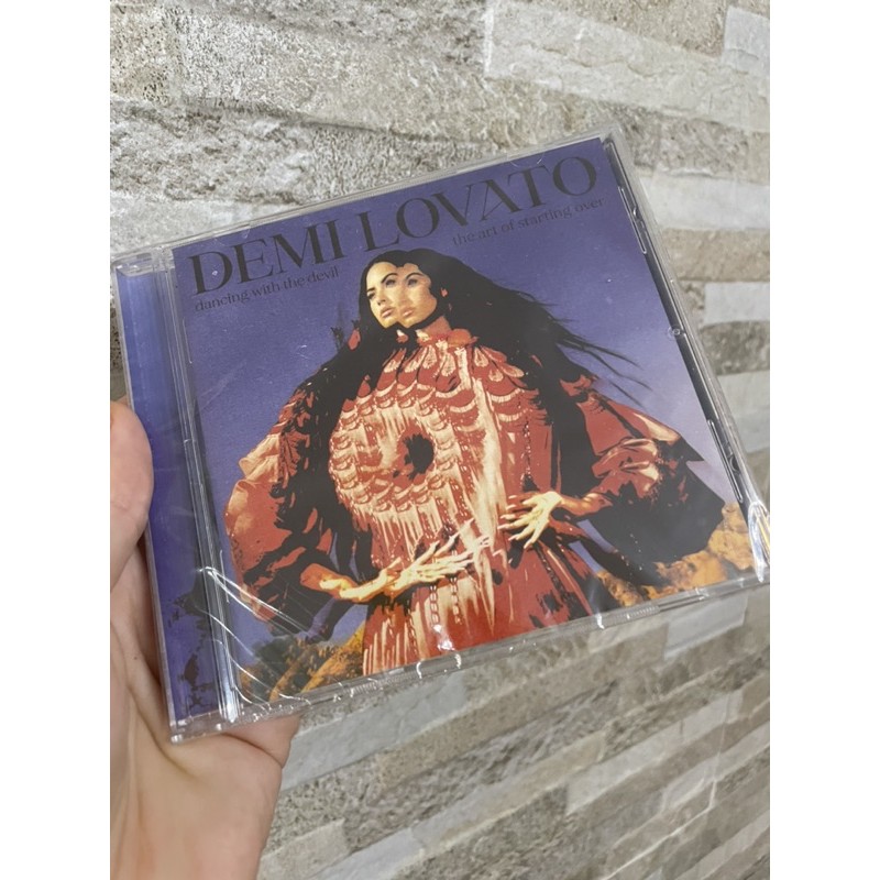 Cd Demi Lovato - Dacing With The Devil Azul (IMPORTADO) | Shopee Brasil