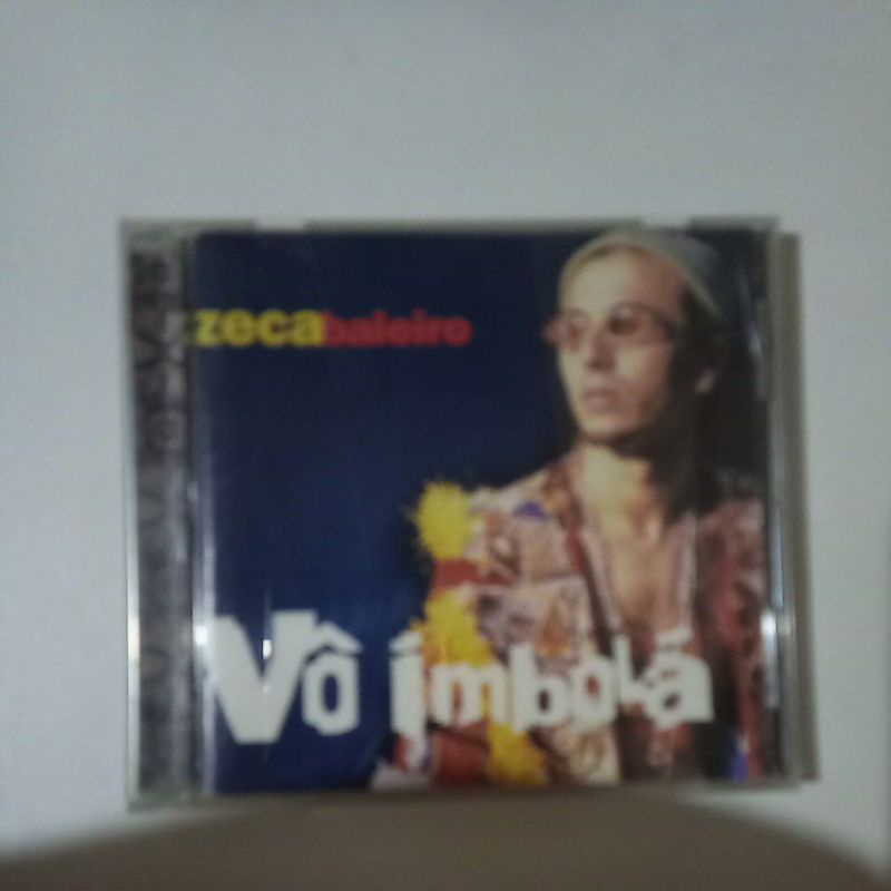 CD Zeca Baleiro Vô imbolá | Shopee Brasil