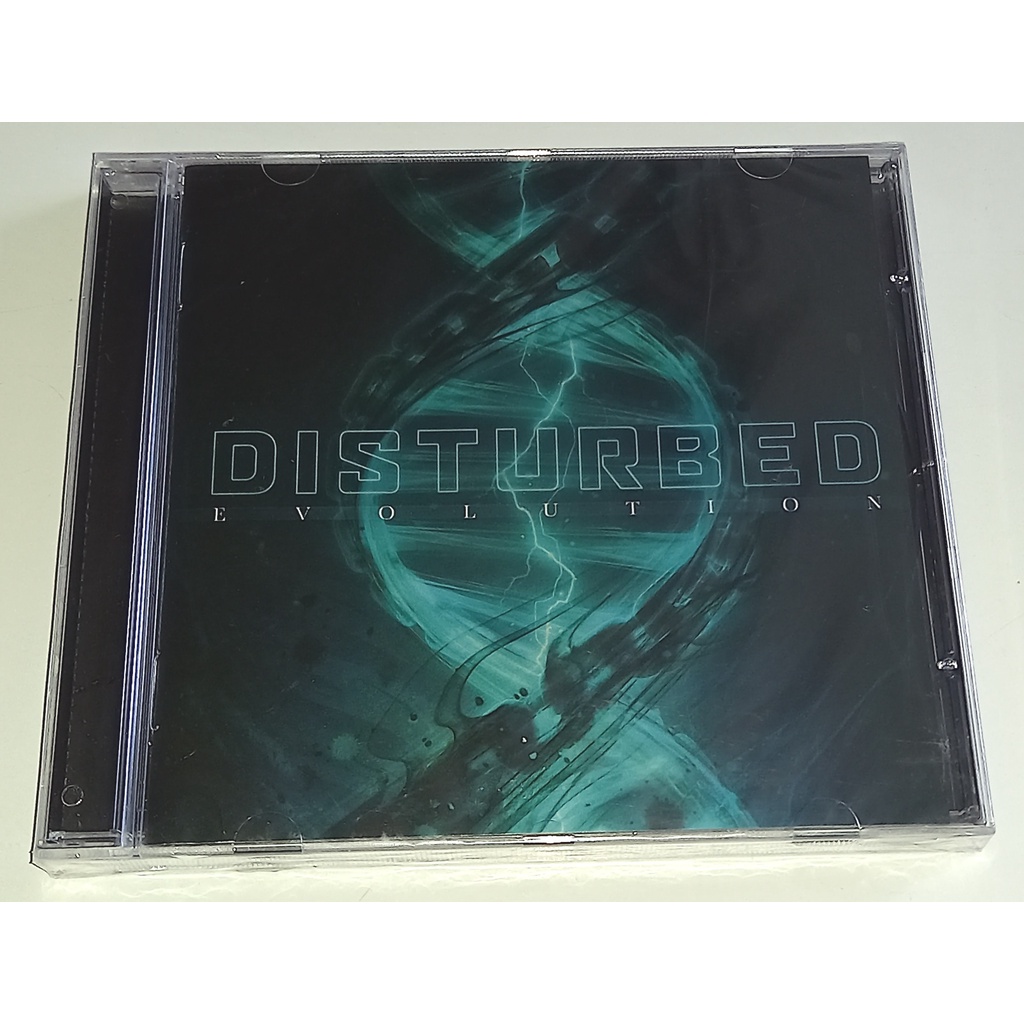 Cd Disturbed - Evolution (lacrado) | Shopee Brasil