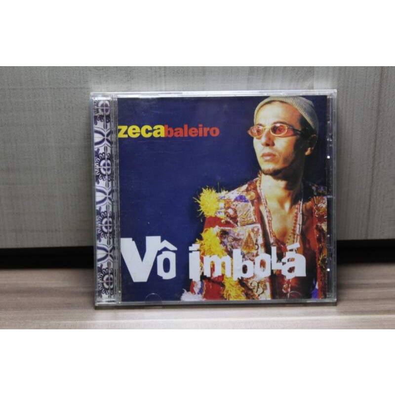 CD Zeca Baleiro - Vô Imbolá | Shopee Brasil