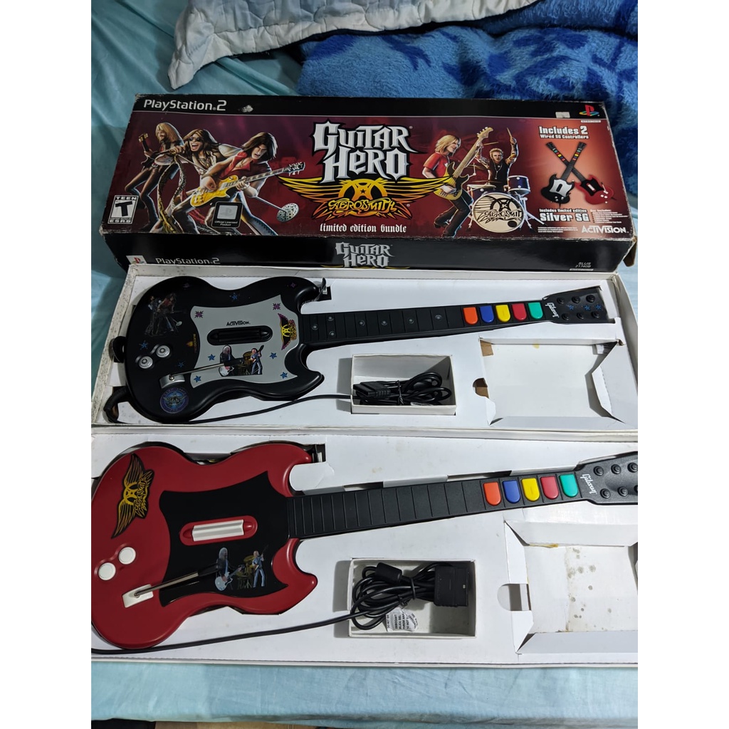 Guitarras Guitar Hero Originais PS2 na Caixa | Shopee Brasil