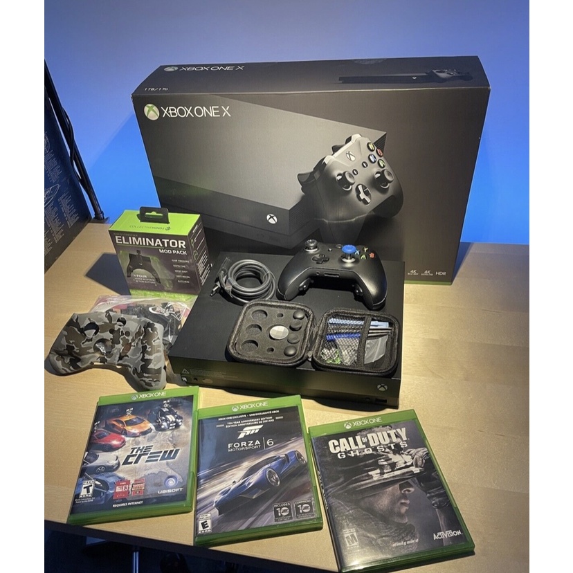 Microsoft Xbox One X 1TB Console - Black - Escorrega o Preço