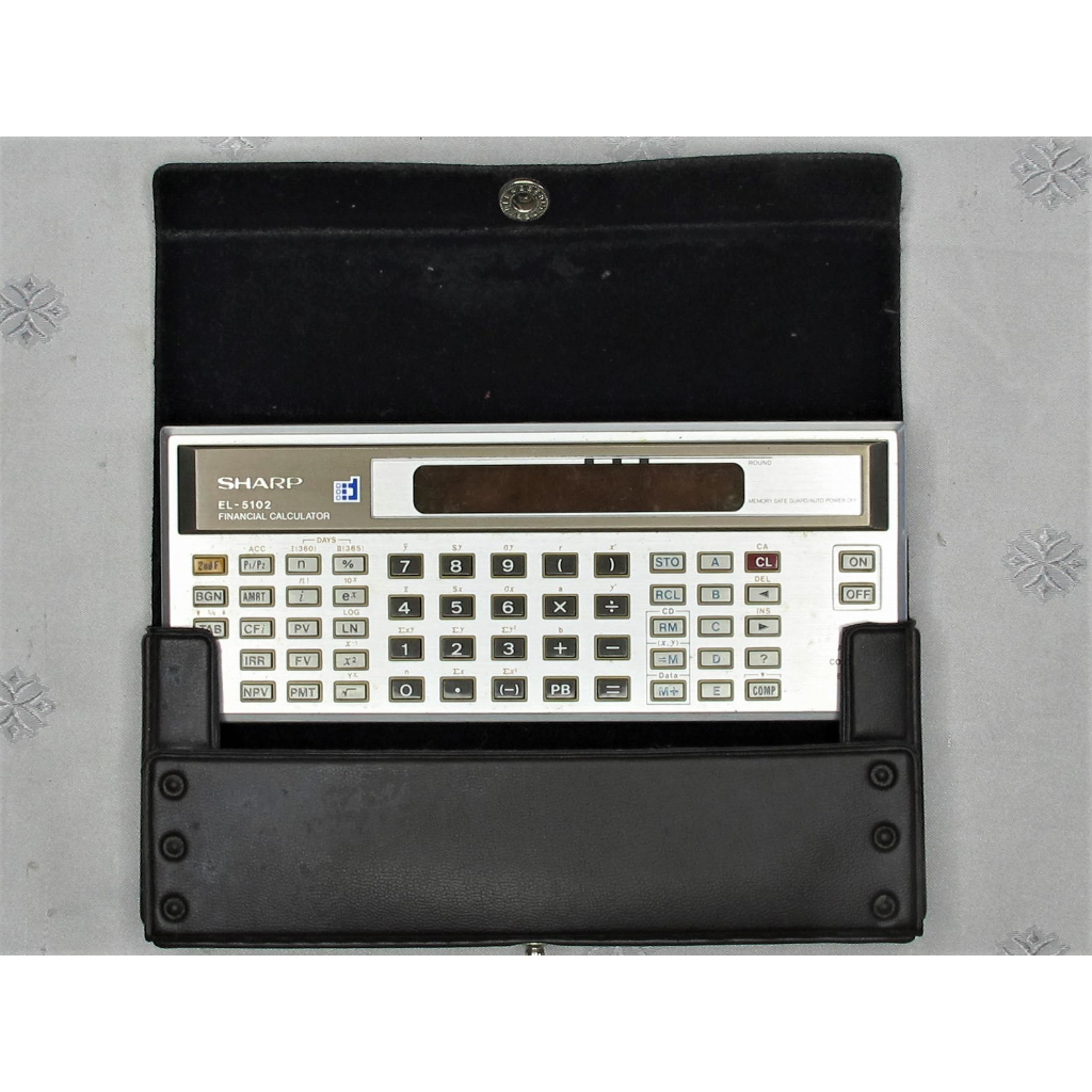 Antiga calculadora financeira - Sharp EL-5102 - Para reparo | Shopee Brasil