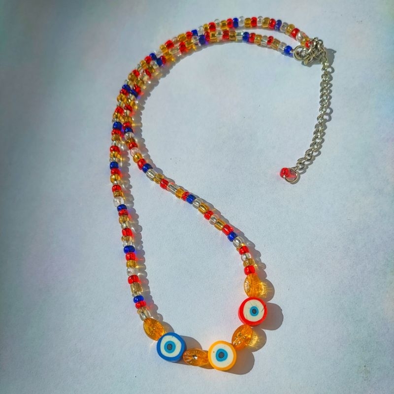 Colar de missangas colorido com olho grego | Shopee Brasil