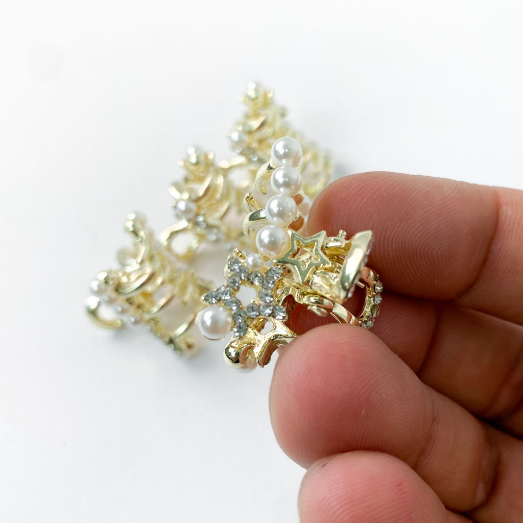 Kit 2 presilhas metal dourado formato estrela strass pérola delicada ...