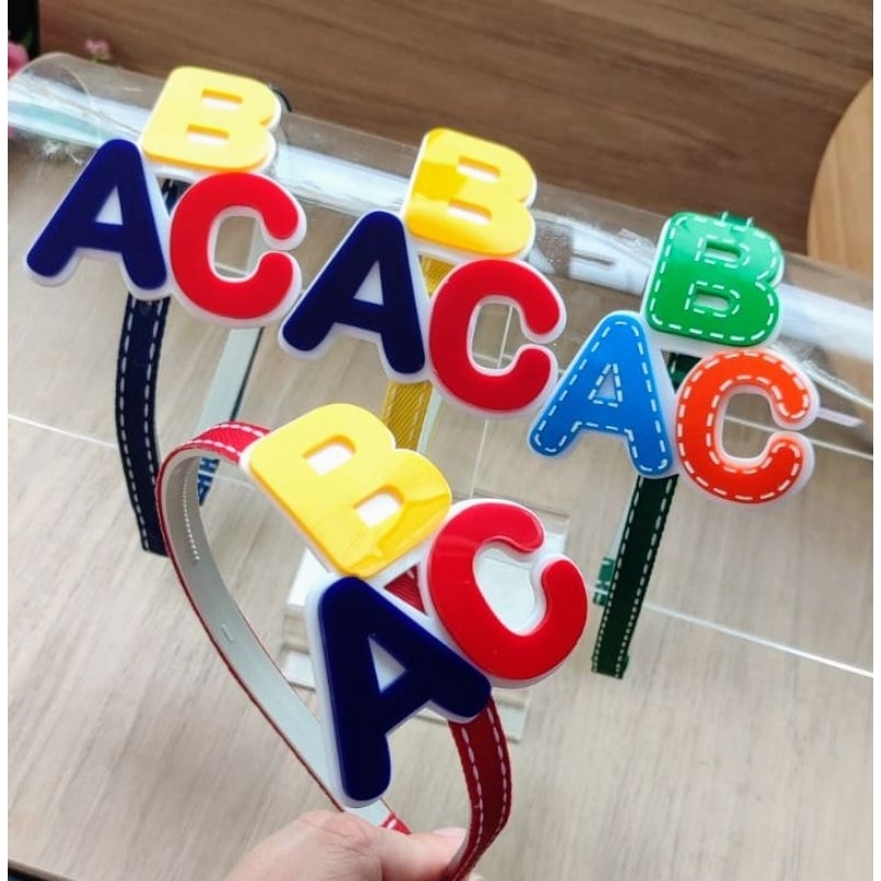 Arco Tiara ABC laço escolar volta as aulas!!! | Shopee Brasil