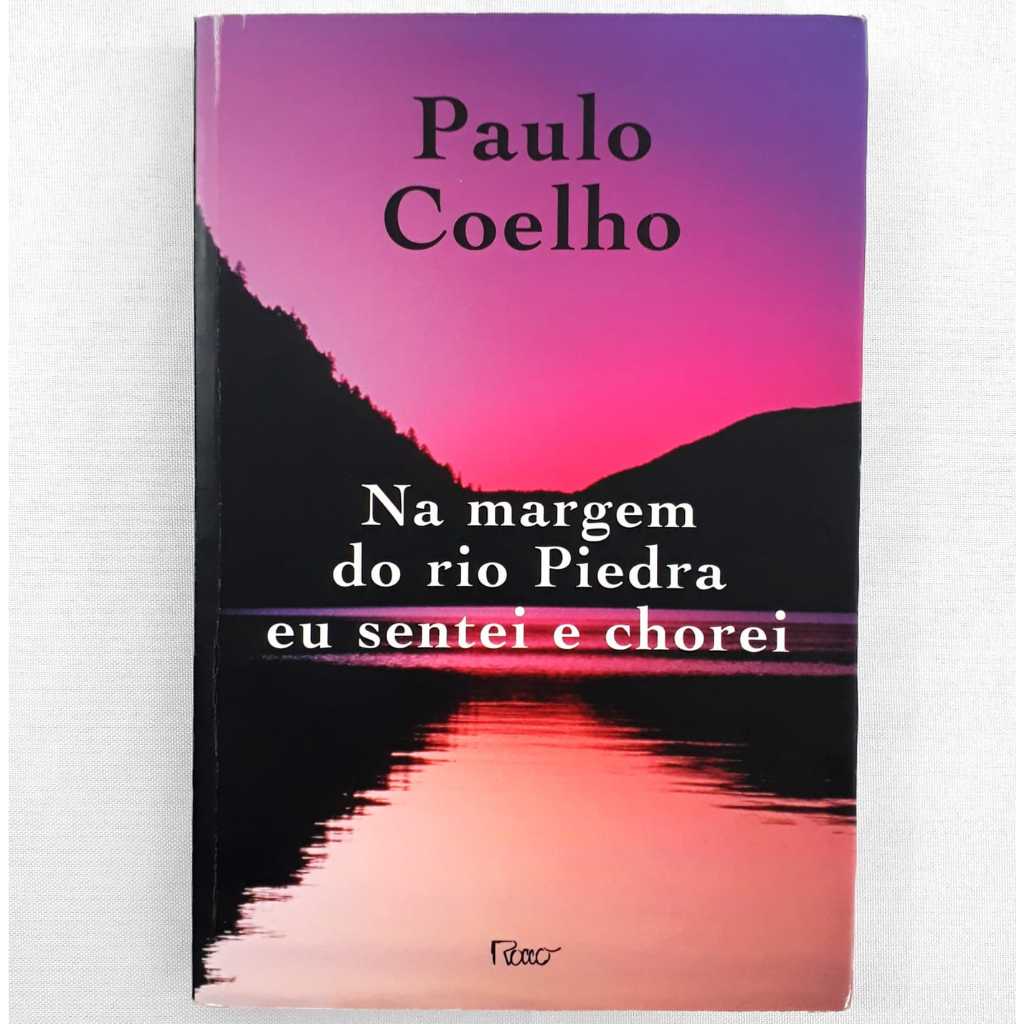 Livro Na Margem do Rio Piedra Eu Sentei e Chorei - Paulo Coelho | Shopee Brasil