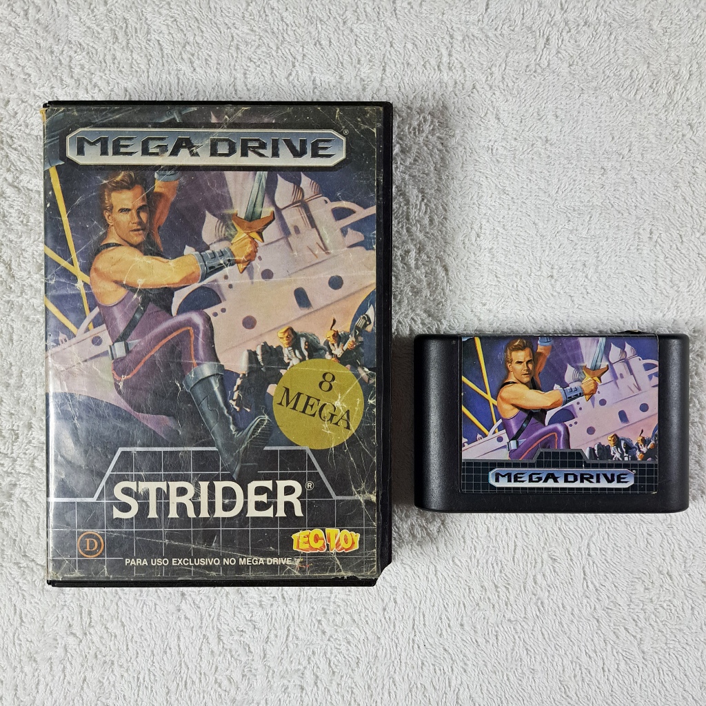 Strider Tectoy com caixa Mega Drive Sega - Escorrega o Preço