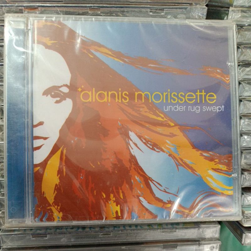 CD ALANIS MORISSETTE/UNDER RUG SWEPT/NOVO. | Shopee Brasil