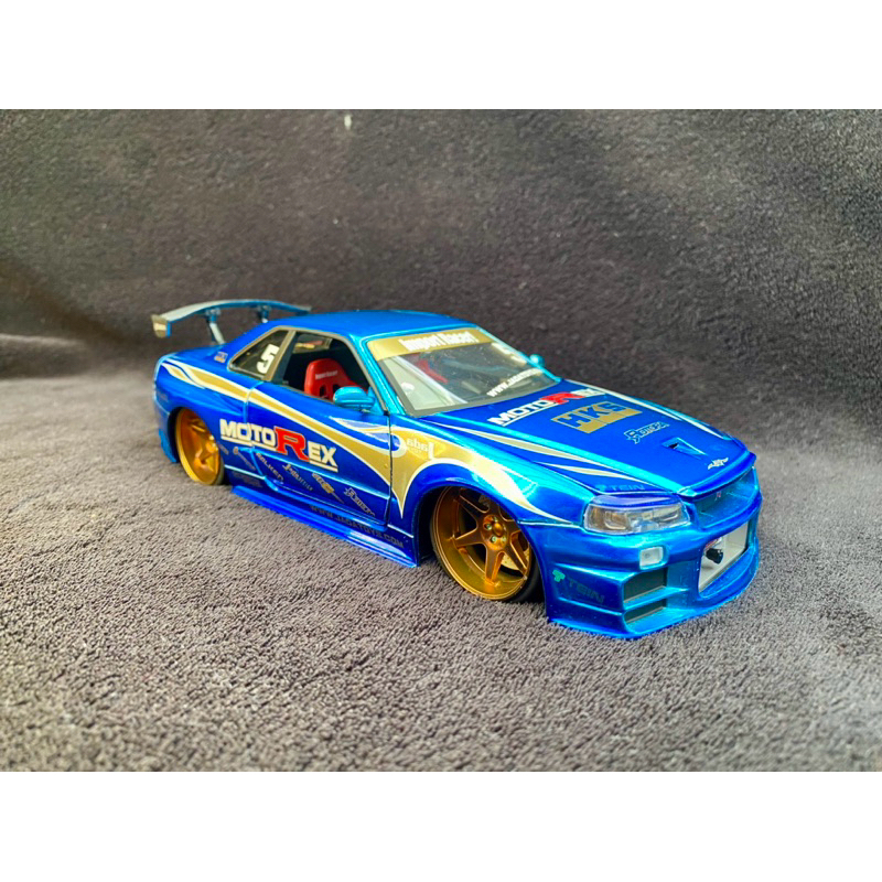 JADA TOYS 1:24 IMPORT RACER MOTOREX NISSAN SKYLINE GT-R R34 RARÍSSIMO ...