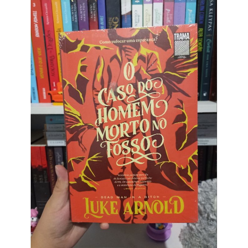 Livro: o caso do homem morto no fosso (LACRADO) | Shopee Brasil