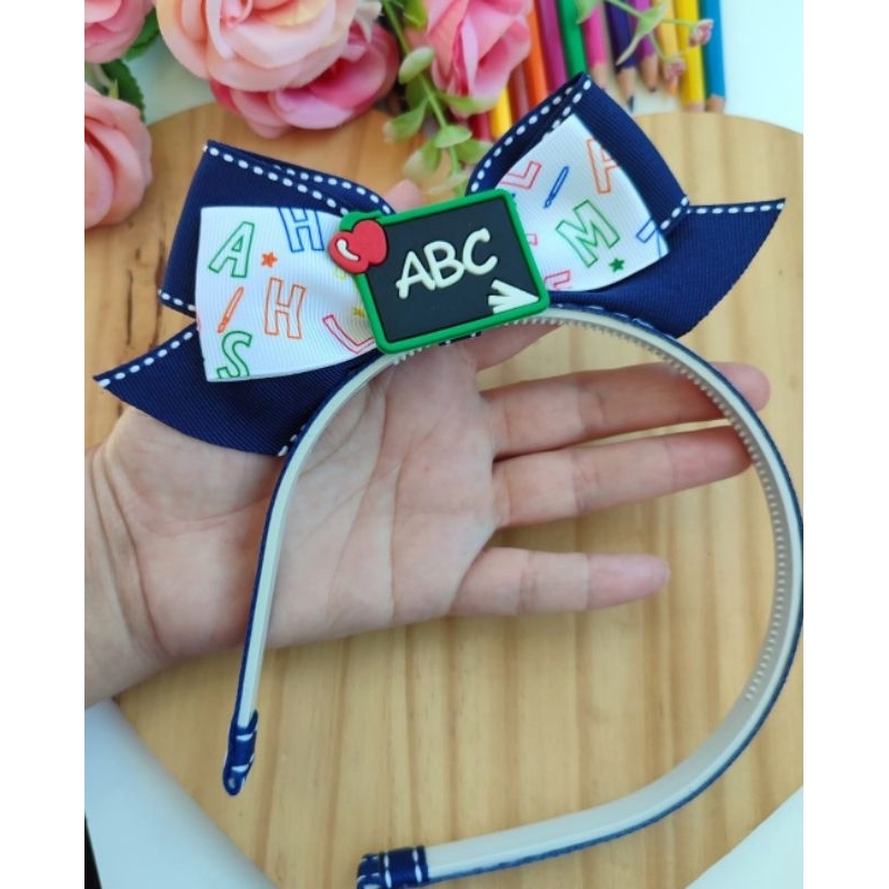 Tiara escolar laço abc letrinhas laço infantil | Shopee Brasil
