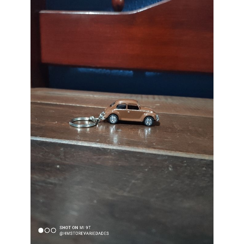 CHAVEIRO MINI FUSCA MARROM CARAVELAS 1/64 ( LEIA A DESCRIÇÃO) | Shopee ...