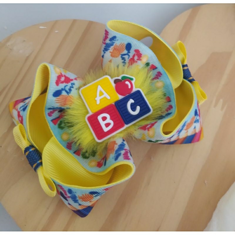 Laços Infantil Escolar/ ABC/ Volta as aulas | Shopee Brasil