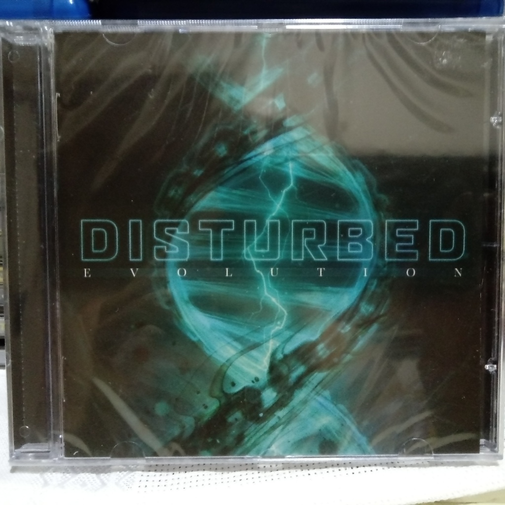 Cd Disturbed - Evolution (Lacrado) | Shopee Brasil