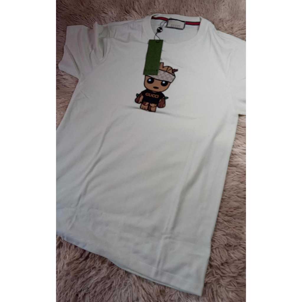 Camisa Gucci Baby Groot Bege | Shopee Brasil