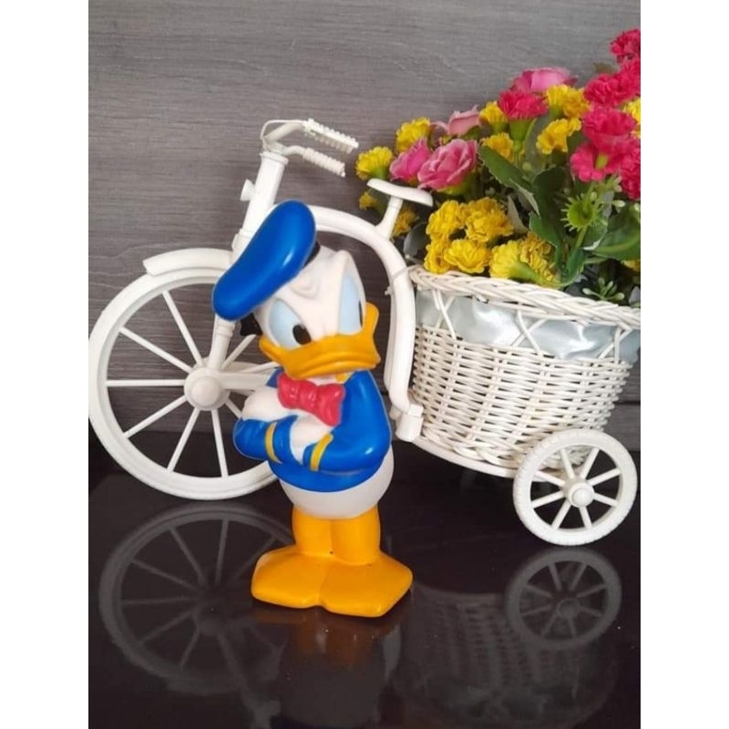pato donald em vinil disney conforme fotos | Shopee Brasil