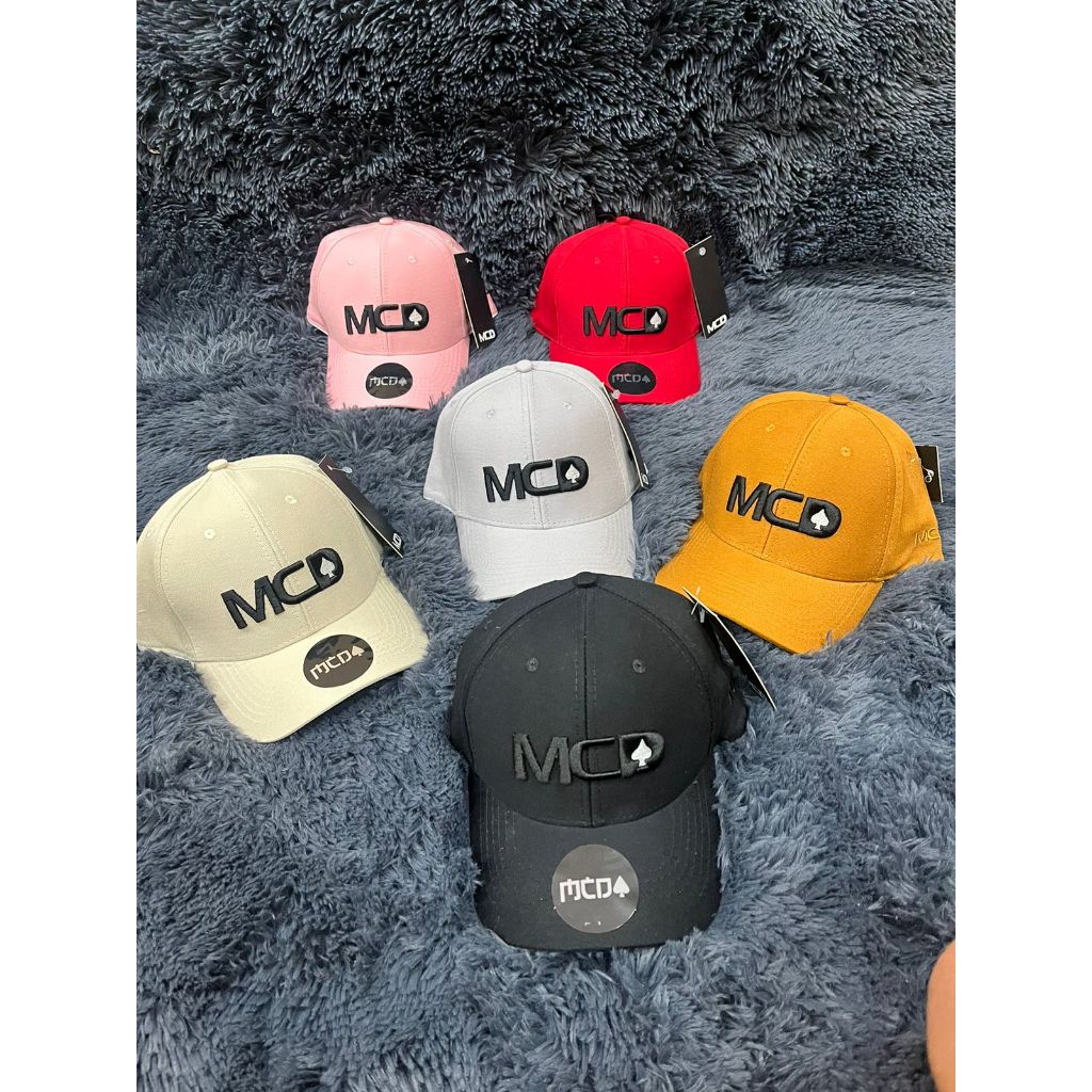 kit 50 bonés MCD 1°linha várias cores da melhor qualidade. | Shopee Brasil