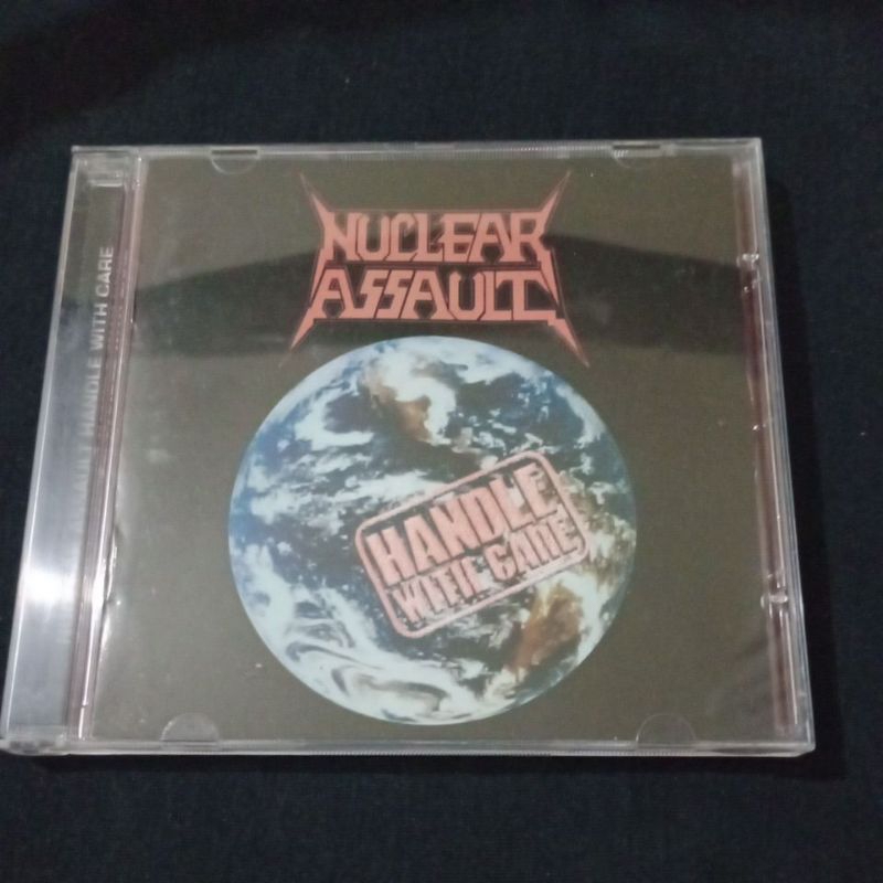 CD NUCLEAR ASSAULT - HANDLE WITH CARE | Shopee Brasil