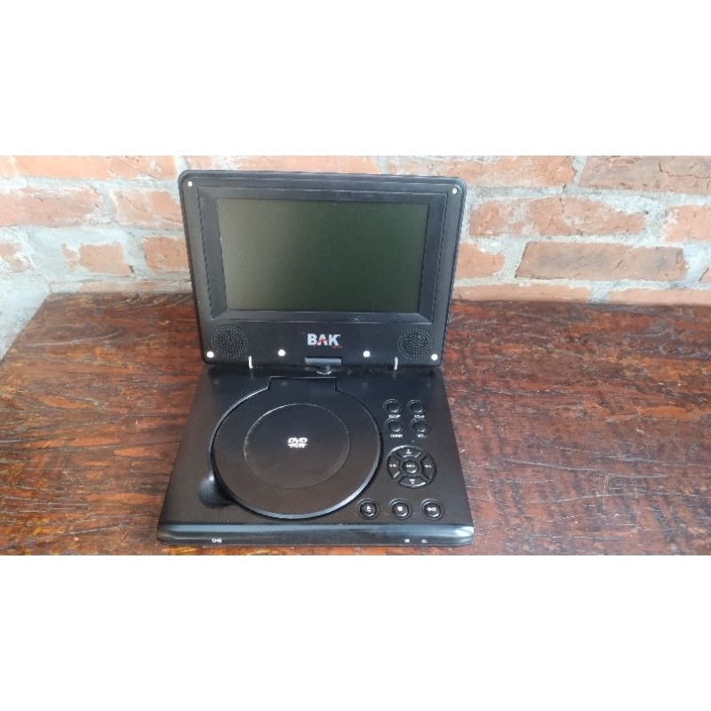 dvd portátil bak bk-dvd-7850tv ( está sem bateria e Fonte ) | Shopee Brasil