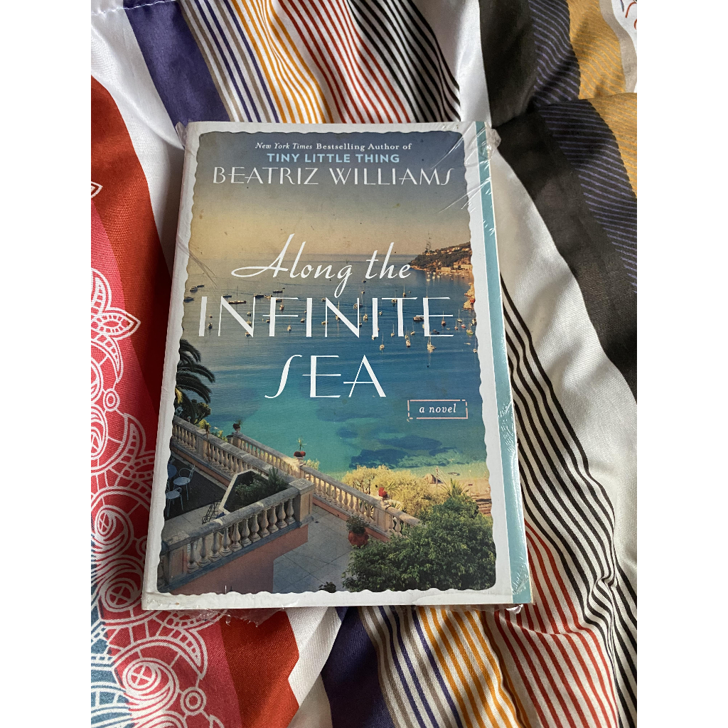 Livro Along the infinite sea | Shopee Brasil
