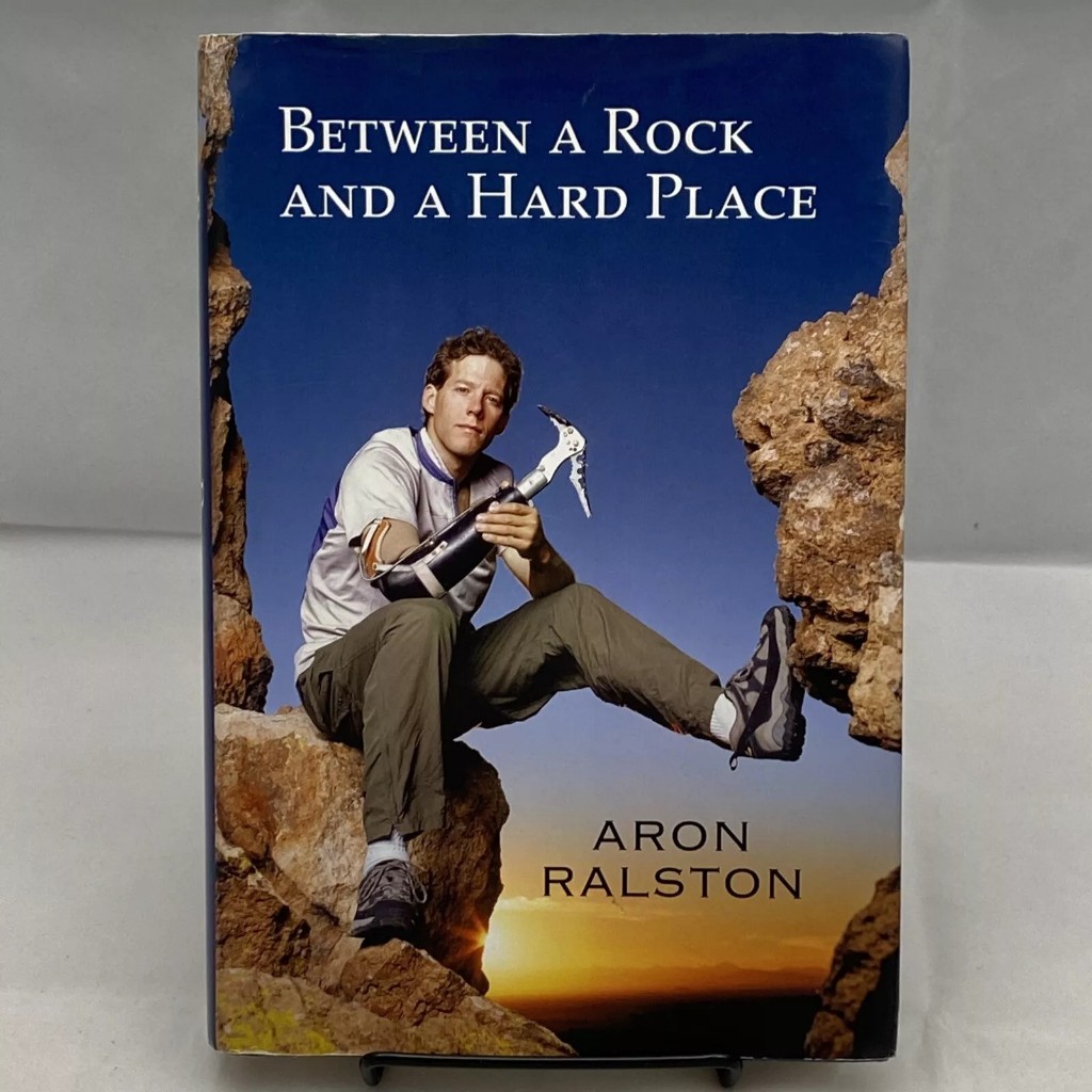Between a Rock and a Hard Place Capa dura – 2004 Edição Inglês por Aron ...