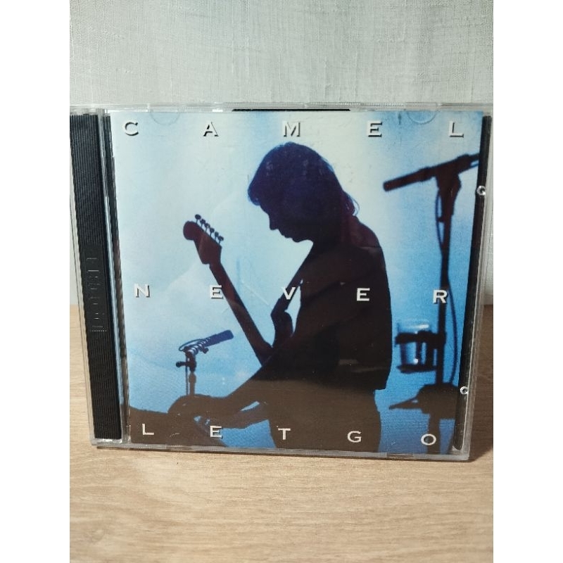 CD Camel - Never Let Go (Importado) | Shopee Brasil