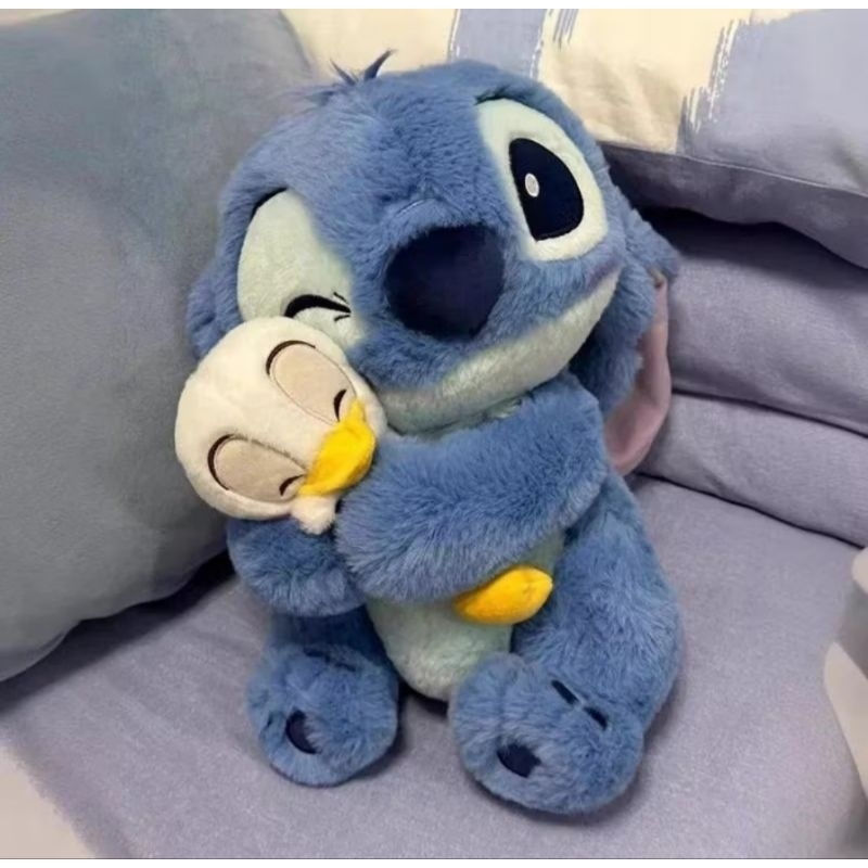 Pelúcia do Stitch azul com pato/ Lilo e Stich Disney 35cm | Shopee Brasil