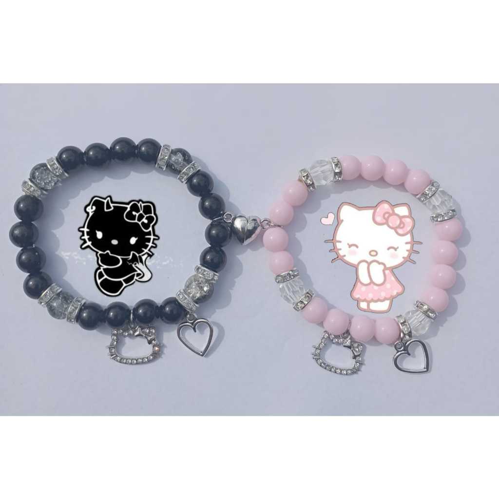 Pulseira hello kitty preta e rosinha | Shopee Brasil