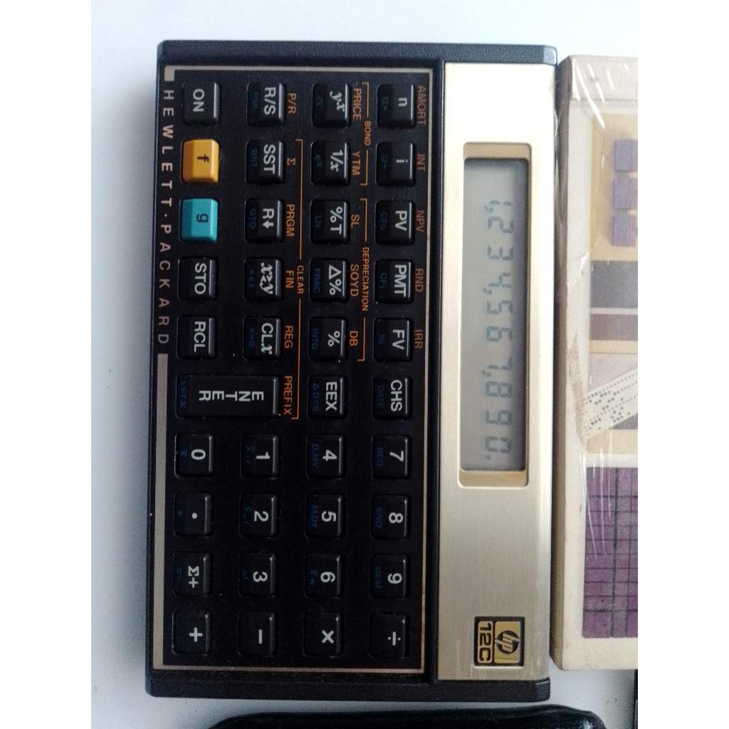 Calculadora HP 12C original funcionando com manual original e capa de ...
