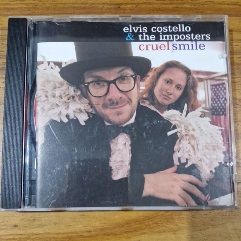 Elvis Costello - Cruel Smile. | Shopee Brasil