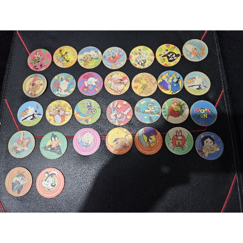 Lote tazos elma chips looney Tunes | Shopee Brasil