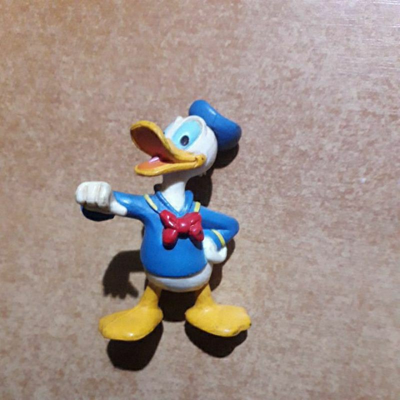 boneco miniatura Pato Donald 3cm | Shopee Brasil