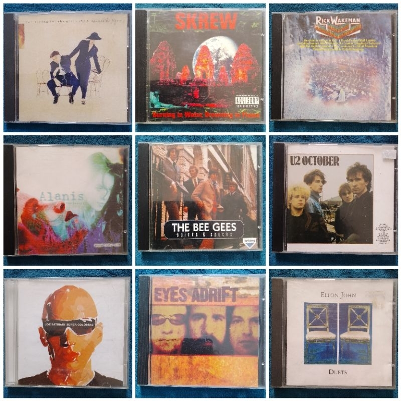 cds - eyes adrift - Joe Satriani super colossal - Elton John duets - U2 ...