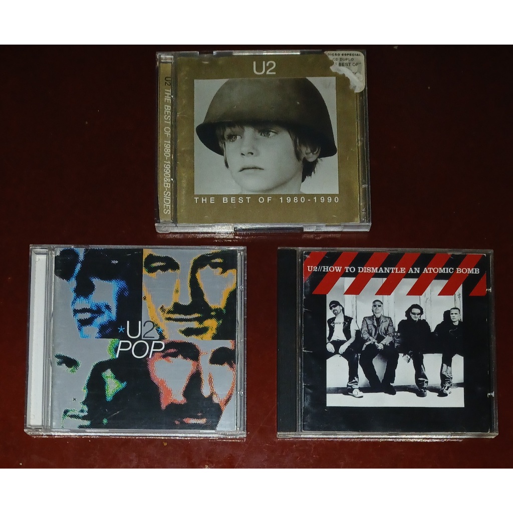 Cds U2: "Pop", "The Best Of 1980-1990 & B-Sides" e "How to Dismantle An ...