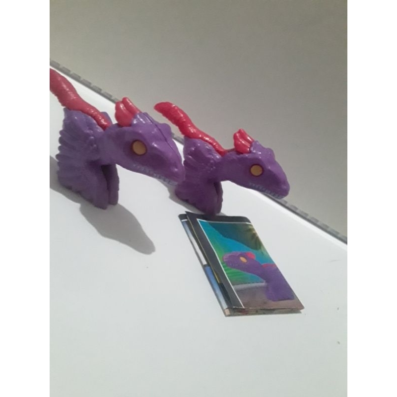 Miniatura Kinder Joy Pyroraptor | Shopee Brasil