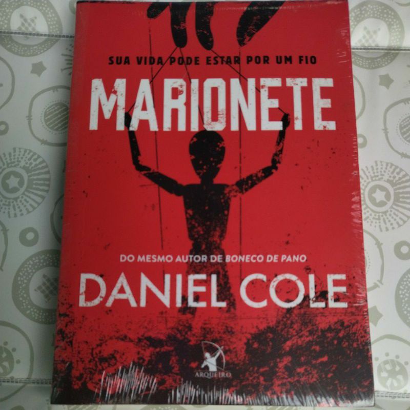 Livro Marionete, Daniel Cole - Lacrado | Shopee Brasil