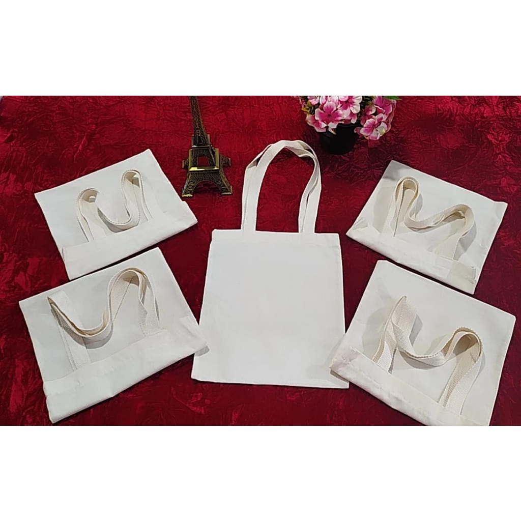Kit com 10 ecobags 25x30cm lisa - 100% algodão cru | Shopee Brasil