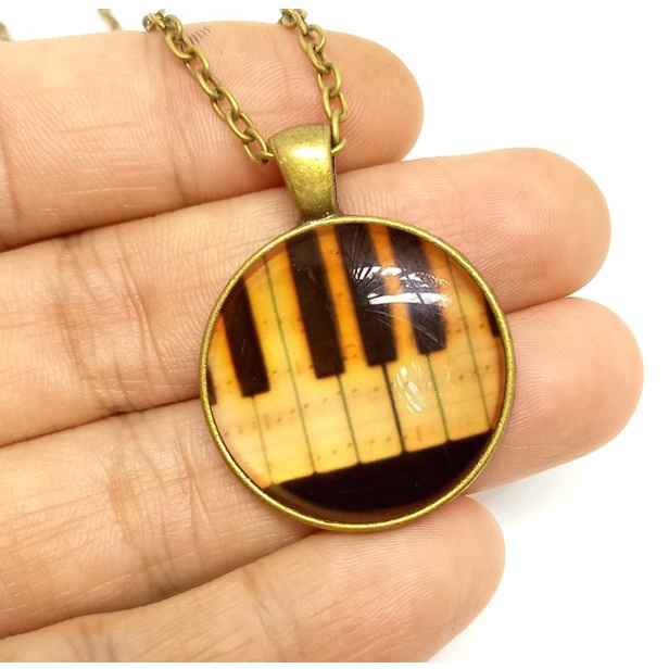 Colar Cabochão Piano Clave Notas Musicais Partitura tribal | Shopee Brasil