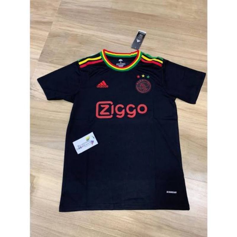 Camisa Oficial Ajax Bob | Rastafari Black Versão Especial 21/22 ...