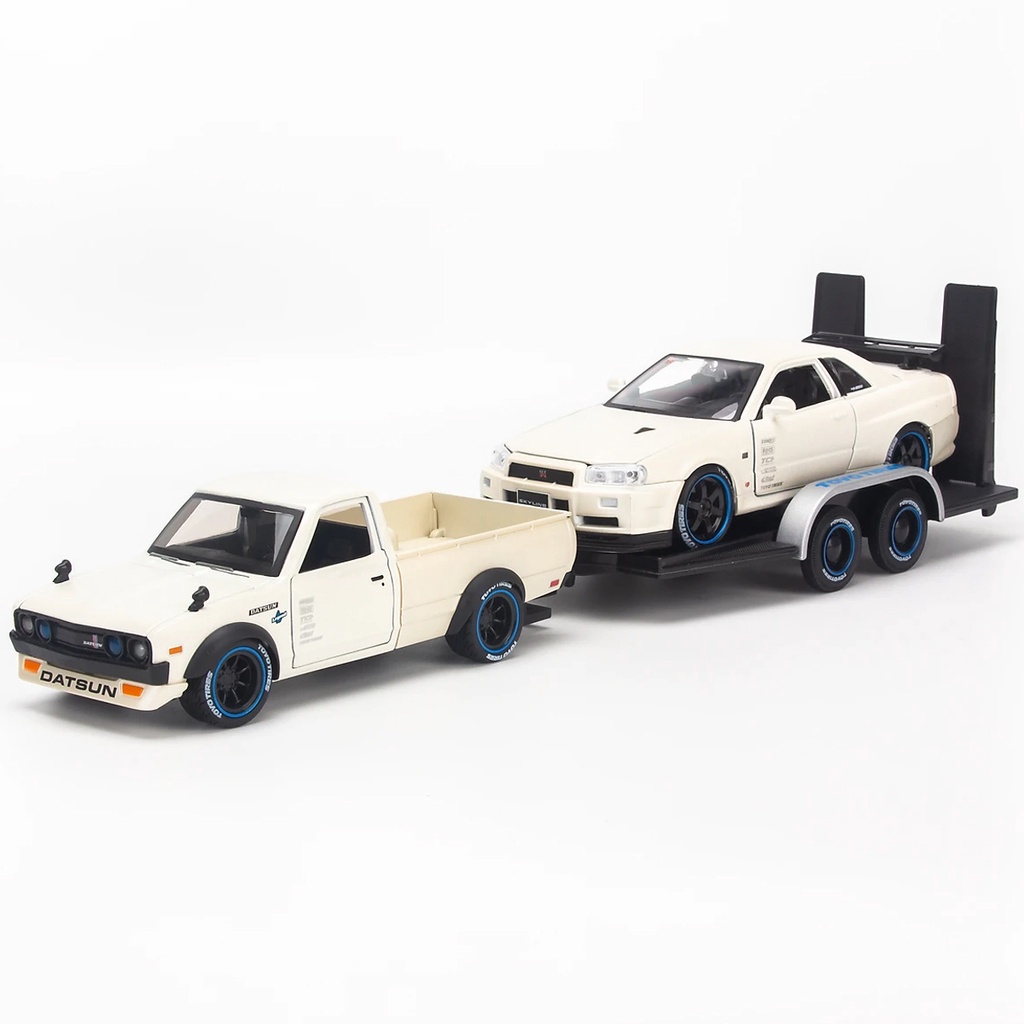 1973 Datsun 620 Pick-up / 1973 Nissan Skyline R34 GT-R - Elite ...