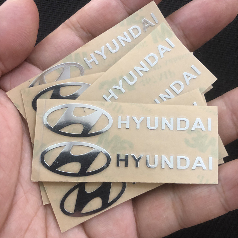 Para a etiqueta do carro de metal dourado do carro Hyundai ix25 ix35, a famosa imagem em ...